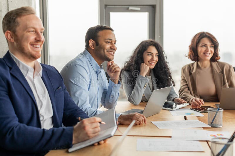 Professionals Collaborating Around Table Modern Office Setting Stock ...