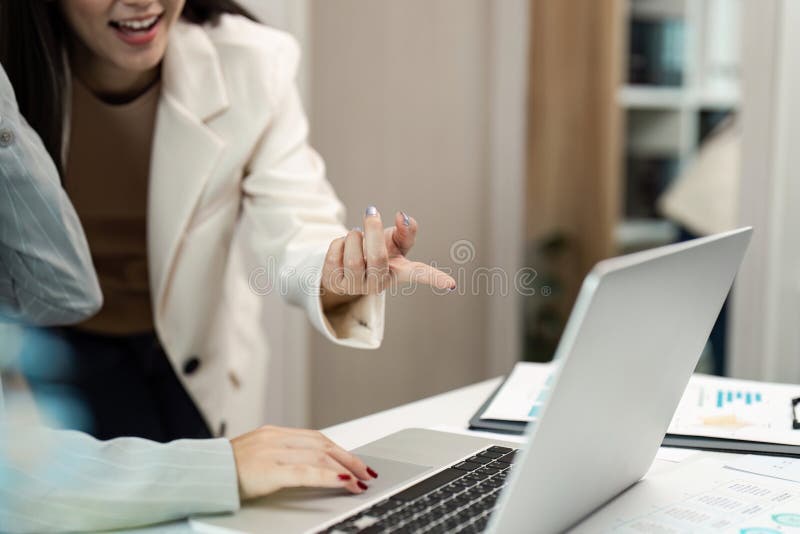 Business Professionals Collaborating on a Project in a Modern Office ...