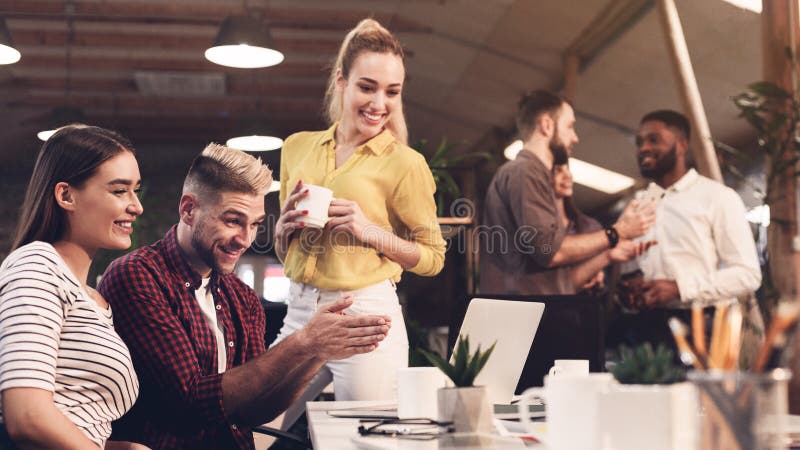 Business Professionals. Young People Analyzing Data on Laptop Stock ...