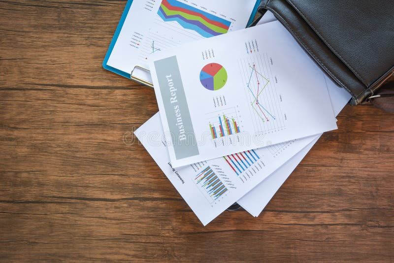 Business Report Chart Preparing Graphs on Briefcase Bag / Summary ...