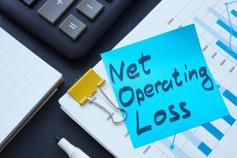 Business Report and Sticker with Words Net Operating Loss. Stock Image ...