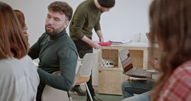 A Group of Workers Focus on Skill Development during a Business Seminar ...