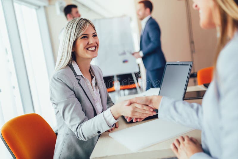 Business Shaking Hand with a Client in Office Stock Image - Image of ...
