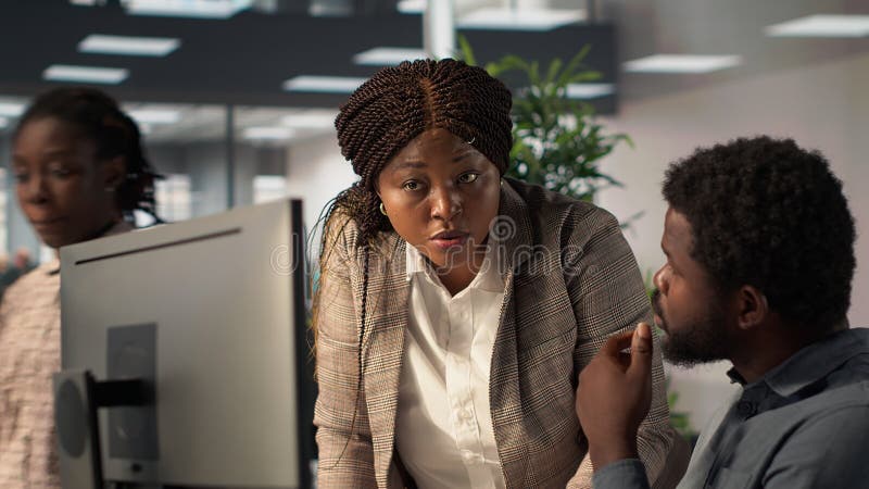 Business Staff Working Together To Review Financial Forecasts and ...