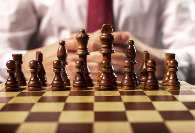 Business Start Up and Control Concept. Male Hands and Chess Board Under ...