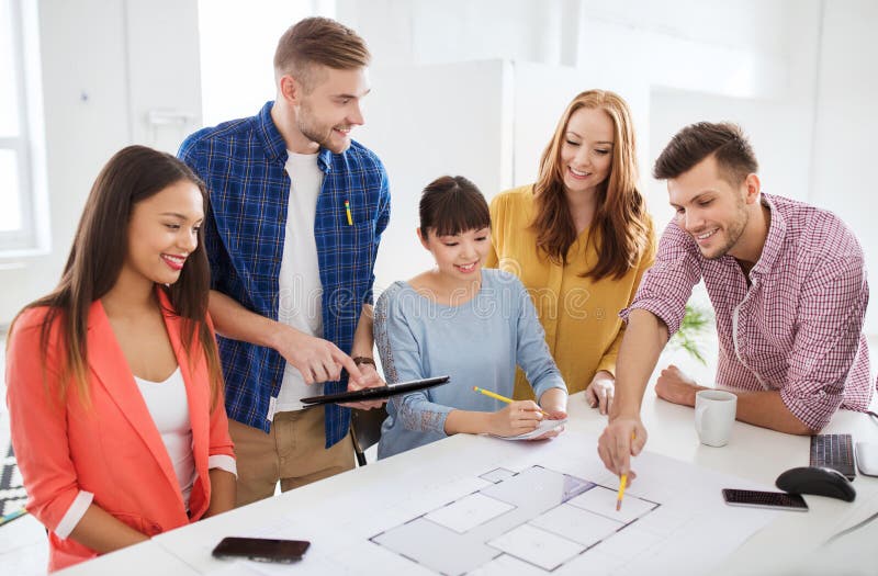 Creative Team with Blueprint Working at Office Stock Image - Image of ...