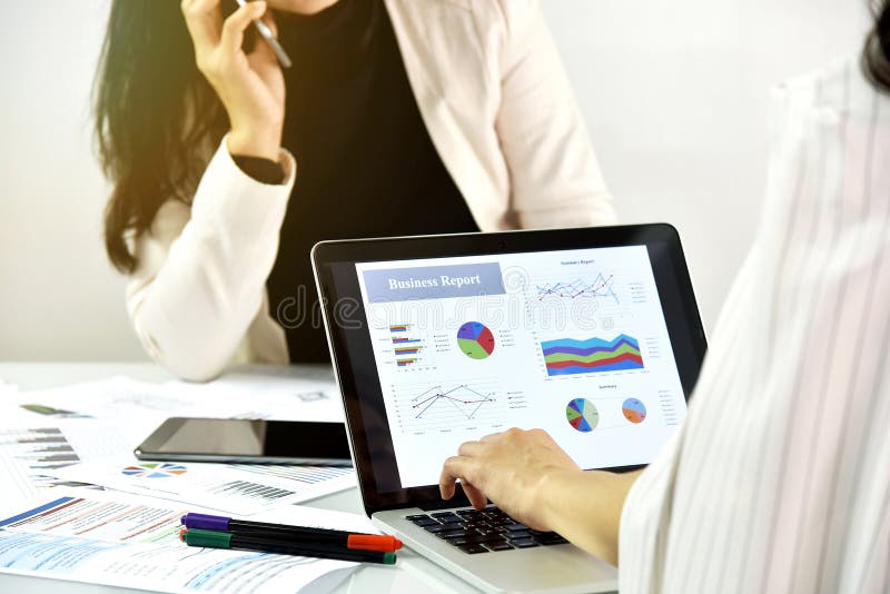 Business Strategy Planning, Business Women Discuss and Review Data ...