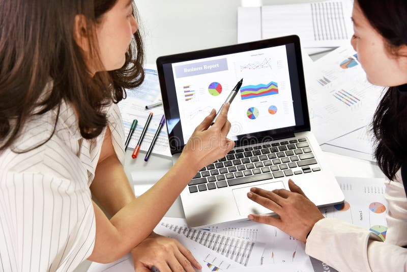 Business Strategy Planning, Business Women Discuss and Review Data ...