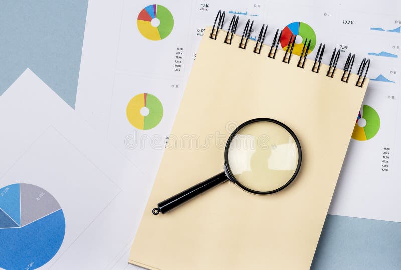 Business Study or Research Concept. Empty Notebook with Magnifying ...