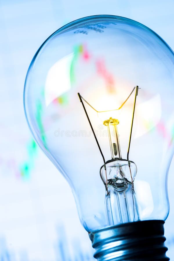Business Success with Stock Graph and Light Bulb Stock Photo - Image of ...