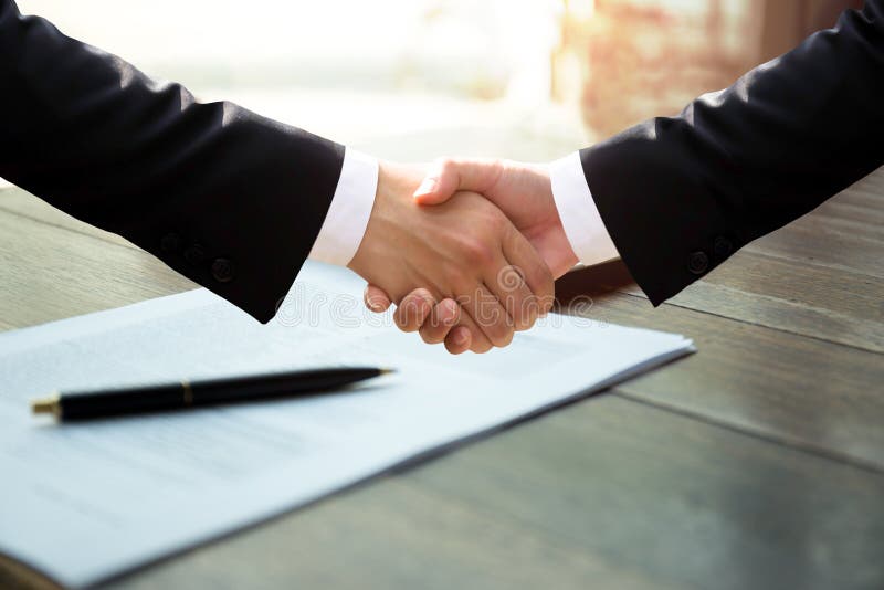 Business Successful Hand Shaking Hands Over Agreement Form Stock Photo ...