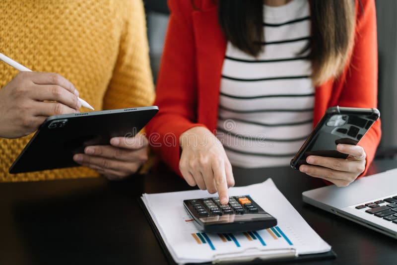 Business Team or Accountant Working on Laptop Computer with Business ...