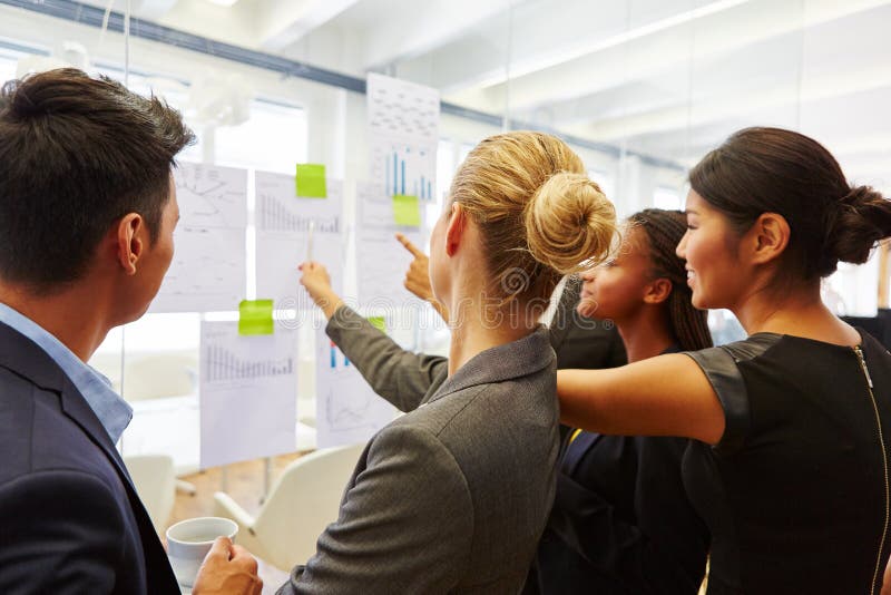 Business Team Analyzing Data Togehter Stock Photo - Image of ... Business Team Analyzing Data Togehter Stock Photo - Image of ...