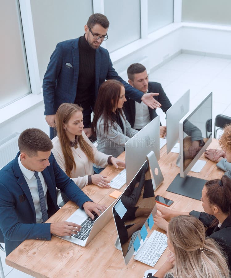 Business Team Analyzing the Information Coming To the Office Stock ...