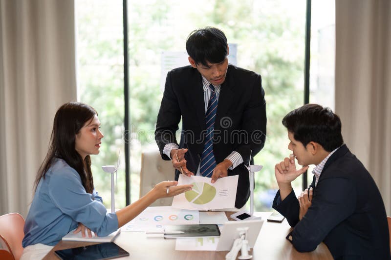 Sustainability and ESG Discussion. Professionals Collaborating on ...