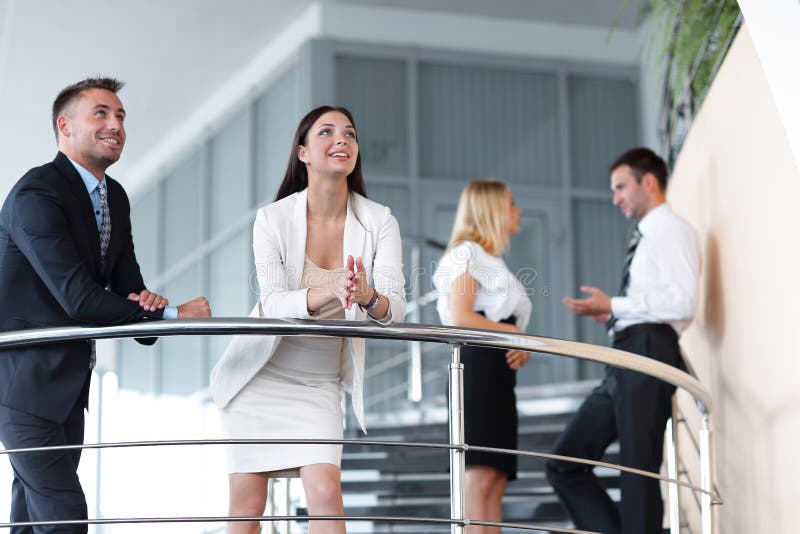 Business Team in a Break from Work, Standing on the Terrace of the ...