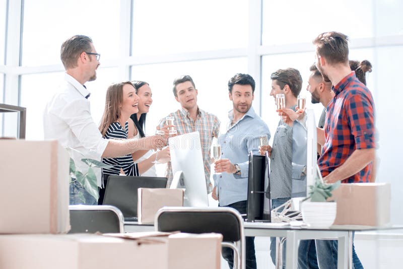 Business Team Celebrates the Move while Standing in the Office Stock ...