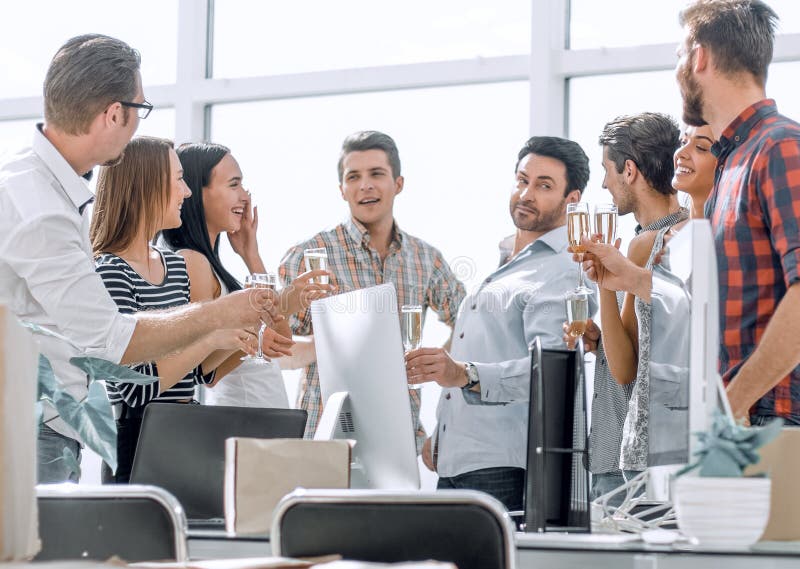 Business Team Celebrates the Move while Standing in the Office Stock ...