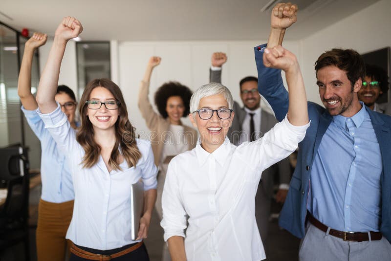 Business Team Celebrating a Good Job in the Office Stock Photo - Image ...