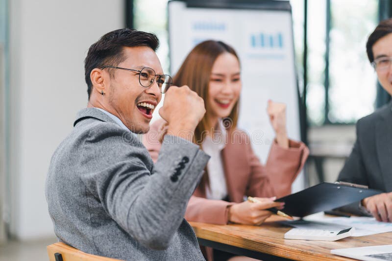 Business Team Celebrating Success in Office Meeting. Stock Image ...