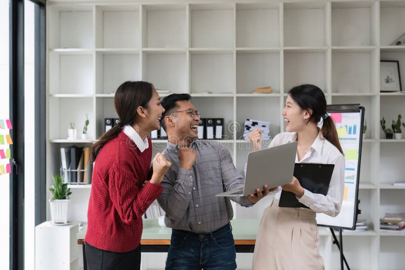 Business Team Celebrating a Triumph with Arms Up Stock Photo - Image of ...