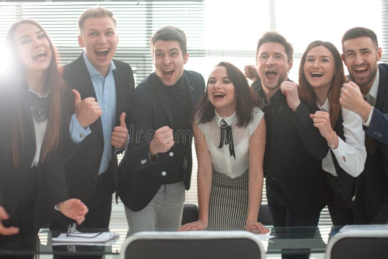 Business Team Celebrating a Triumph with Arms Up Stock Photo - Image of ...