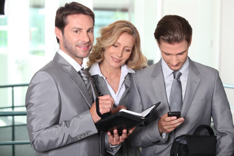 Business Team Checking Diary Stock Photo - Image of people, mobile ...
