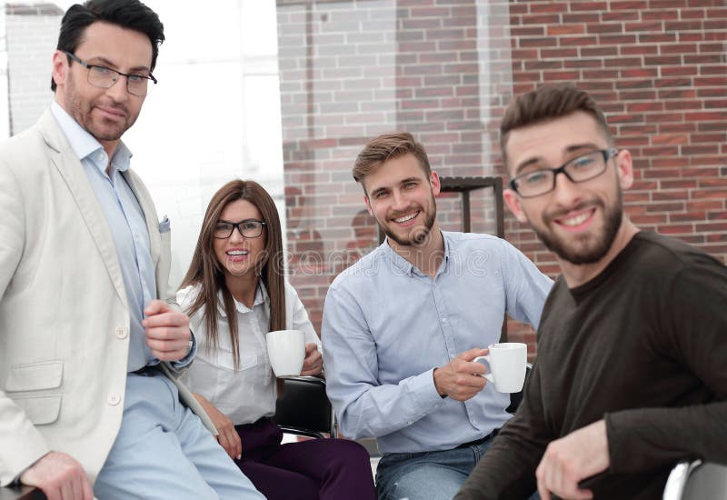Business Team in the Coffee Break in the Workplace Stock Photo - Image ...