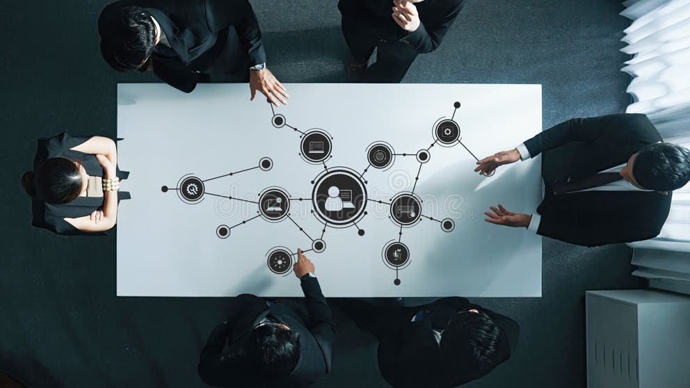 Business Team Collaborating on Digital Strategy with Graphical ...