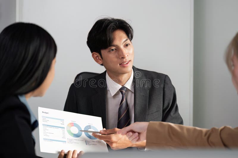 Business Team Collaborating in Modern Office Setting for Innovative ...