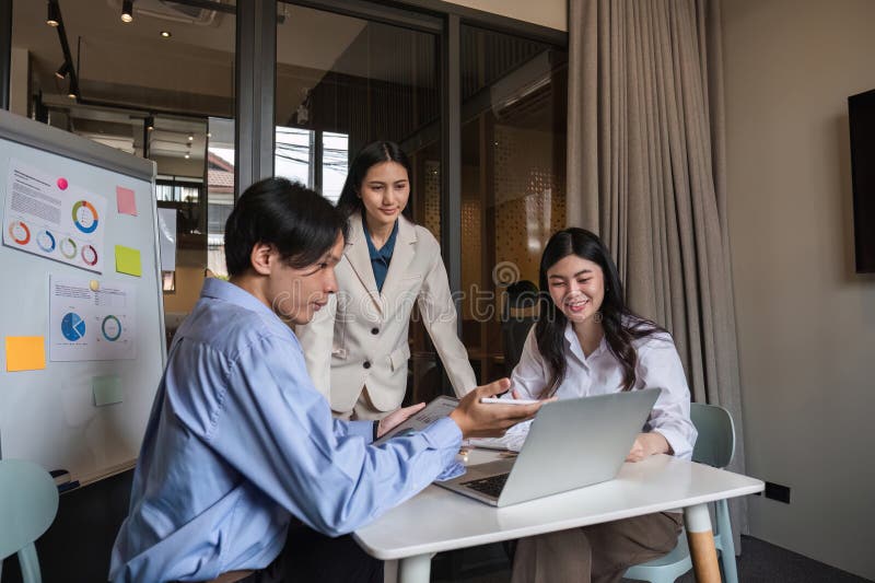 Business Team Collaborating in Modern Office Setting To Strategize and ...