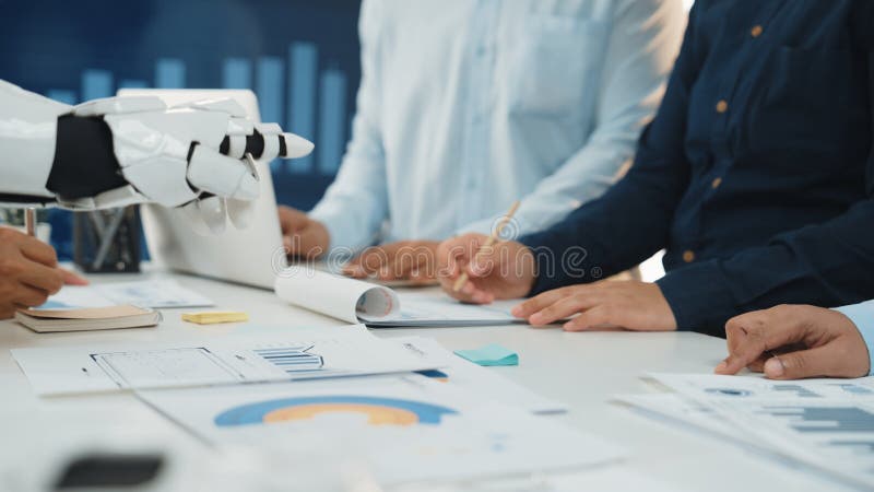 Business Team Collaborating with Robot Assistance for Data Analysis and Strategy Development in ...