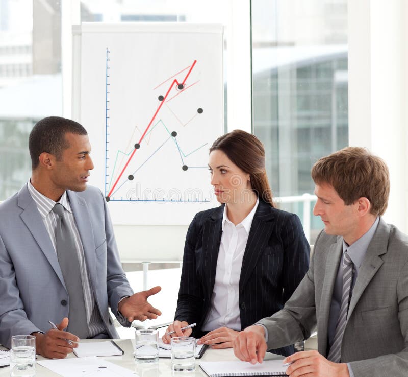 Business Team Conversing in a Business Meeting Stock Photo - Image of ...