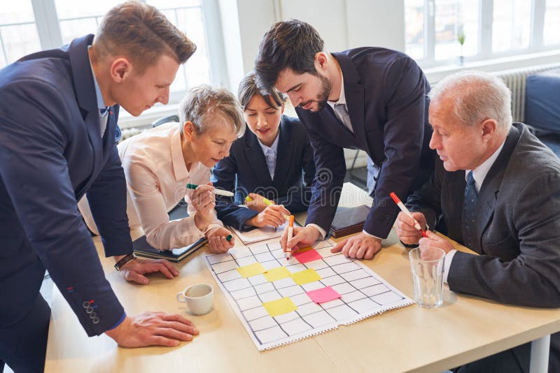 Business Team in Creative Workshop Stock Image - Image of cooperation ...
