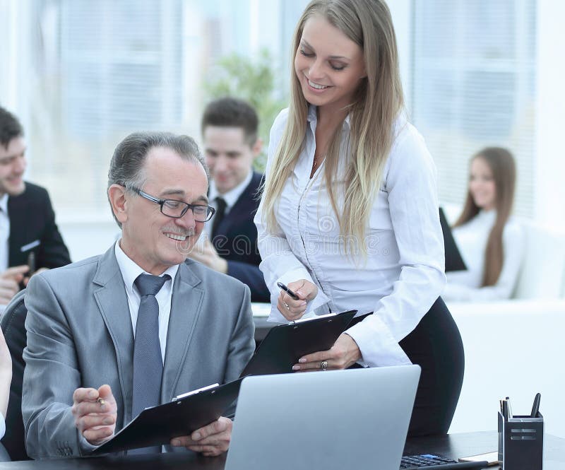 Business Team Discussing with the Head of Financial Data Stock Photo ...