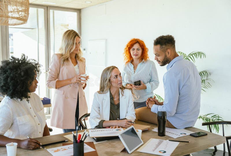 Business Team Discussing Ideas while Having a Meeting for a New Project ...