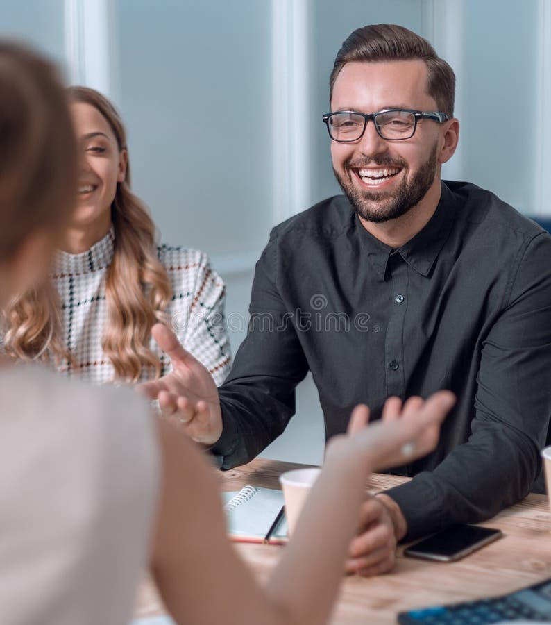 Business Team Discussing Business Issues Over a Cup of Coffee Stock ...