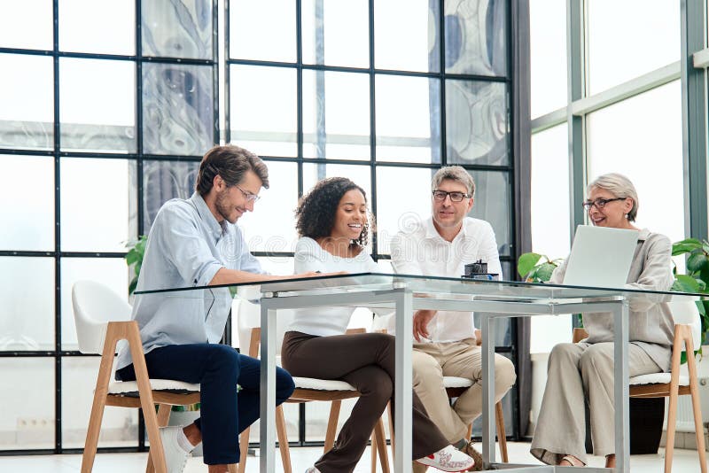 Business Team Discussing at a Meeting in the Office. Stock Photo ...