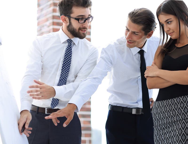 Business Team Discussing a New Idea. Stock Photo - Image of document ... Business Team Discussing a New Idea. Stock Photo - Image of document ...