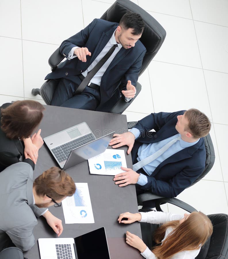 Business Team Discussing in Office Financial Issues Stock Photo - Image ...