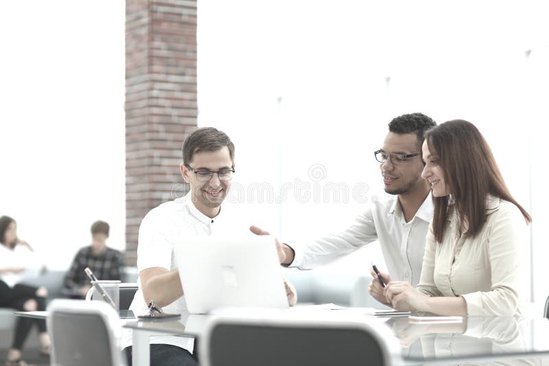 Business Team Discussing Online Information at Work Meeting Stock Photo ...