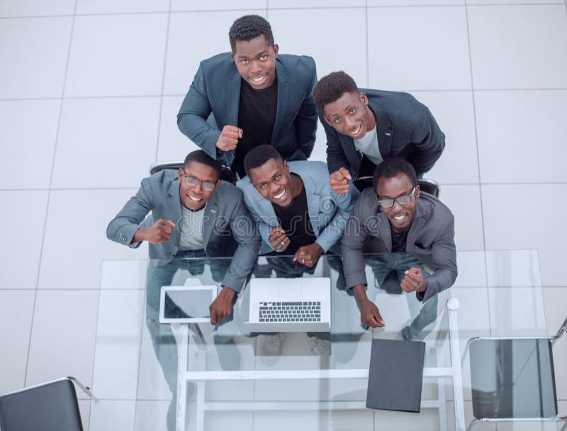 Business Team Discussing the Online Information in the Workplace. Stock ...