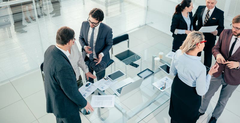 Business Team Discussing Work Issues in the Office. Stock Image - Image ...