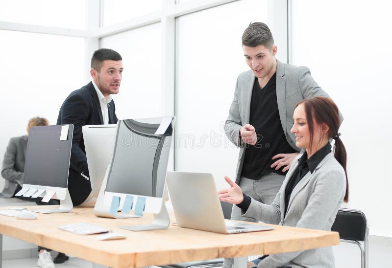 Business Team Discussing Work Issues Standing in the Office Stock Photo ...