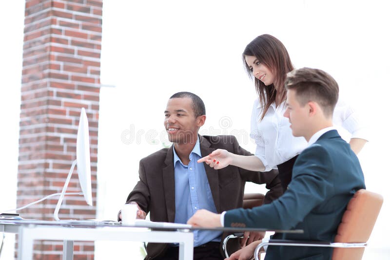 Business Team Discussing Work Problems Sitting at Their Desk Stock ...