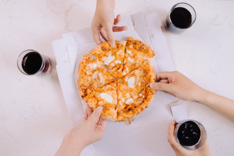 Business Team is Eating Pizza at Work while Working Stock Image - Image ...