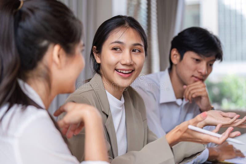 Business Team Engaging in a Collaborative Discussion and Idea Exchange ...