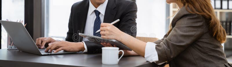 Business Team or Financial Data Analysts Working with Tablets and Laptop Computers and Data ...