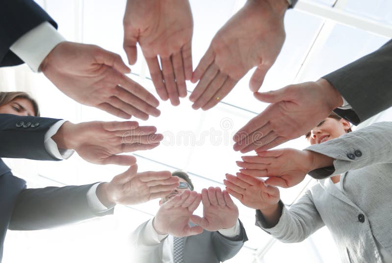 Business Team with Folded Their Hands in a Circle Stock Photo - Image ...