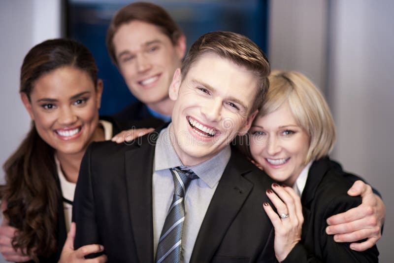 Business Team of Four Having Fun at Work Stock Photo - Image of ...